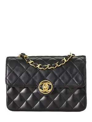 CHANEL Quilted Lambskin Circle Lock Half Flap Mini