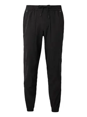 Lululemon License To Train Slim-fit Tapered Stretch Recycled-shell Track Pants - Black
