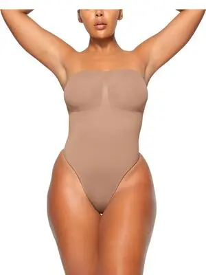 SKIMS Seamless Sculpt Strapless Thong Bodysuit - Sienna