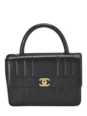 CHANEL Vertical Lambskin Kelly Handheld