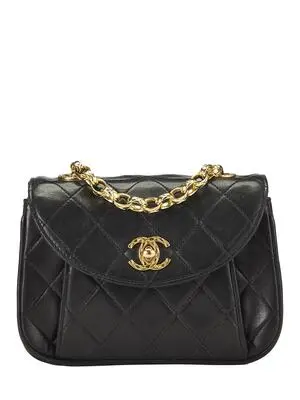CHANEL Quilted Lambskin Round Flap Mini