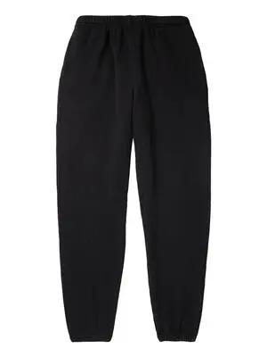 LES TIEN Tapered Garment-dyed Cotton-jersey Sweatpants - Black