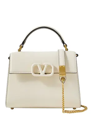 Valentino Garavani Valentino Garavani Vsling Mini Textured-leather Shoulder Bag Ivory