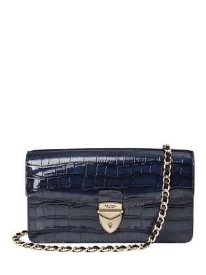 ASPINAL OF LONDON ASPINAL OF LONDON Mayfair 2 Leather Crocodile Print Clutch Bag With Chain Strap Navy