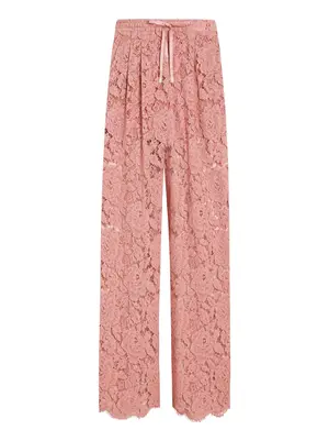 Dolce & Gabbana Flared Floral Cordonetto Lace Pants With Logo - Pink