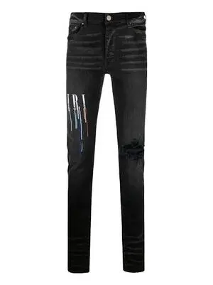 Amiri Embroidered Paint Drip Logo Skinny Jeans - Black