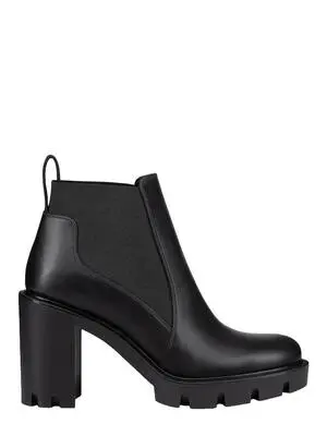 CHRISTIAN LOUBOUTIN Marchacroche Lug Booties - Black
