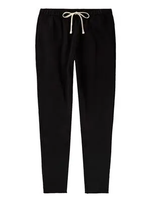 LES TIEN Tapered Garment-dyed Cotton-jersey Sweatpants - Black