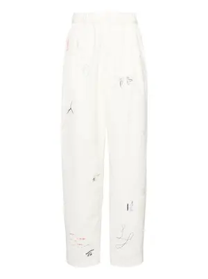 UNDERCOVERISM Undercover Sketch-Style Printed Trousers