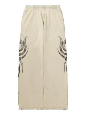 Balenciaga Wide-leg Distressed Printed Cotton-jersey Sweatpants - Neutrals