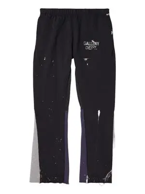 GALLERY DEPT. Flared Paint-splattered Panelled Logo-print Cotton-jersey Sweatpants - Gray