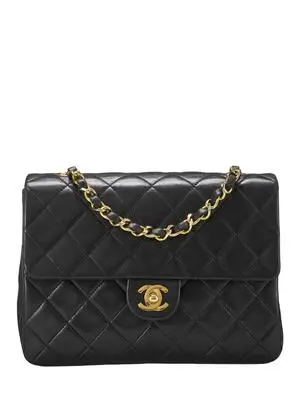CHANEL Quilted Lambskin Half Flap Bag