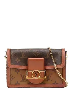 LOUIS VUITTON Monogram Reverse Dauphine Wallet On Chain - Brown