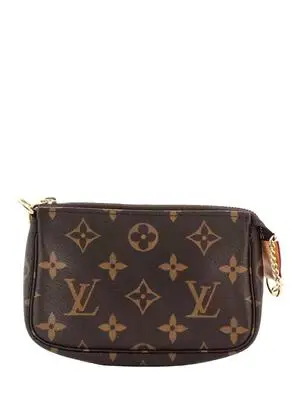 LOUIS VUITTON Pochette Accessoires Monogram Canvas Mini Clutch - Brown