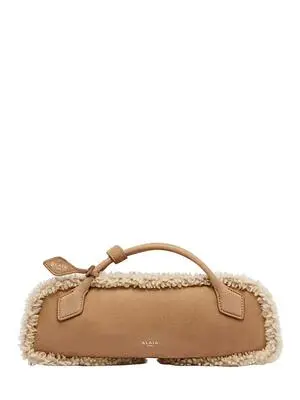 ALAÏA Alaïa Le Teckel Small Suede Clutch