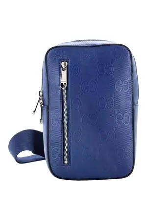 Gucci Sling Gg Embossed Perforated Leather Backpack - Blue
