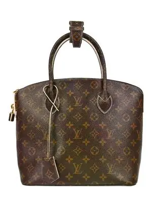 LOUIS VUITTON 2011 Louis Vuitton PM Lock It Monogram-Pattern Tote Bag