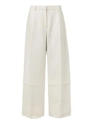 KHAITE Linden Tiered Frayed Linen Pants