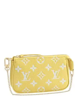 LOUIS VUITTON Pochette Accessories Mini Monogram Empreinte - Lemon Curd Yellow