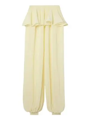 Alaïa Pleated Georgette Peplum Tapered Pants - Yellow