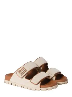 MIU MIU Canvas Slides