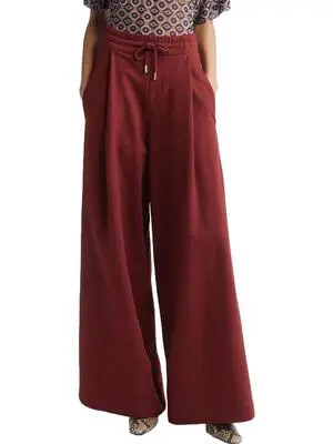 Dries Van Noten Hadium Pleated Cotton Wide Leg Sweatpants - Ruby