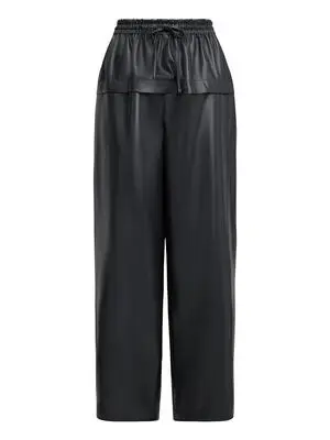 ALAÏA Alaïa Leather Peplum Trousers