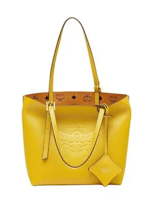 Mcm Himmel Embossed Logo Leather Shopper - Lemon Gold