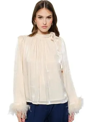 JUPE NYC Metallic Shimmer Blouse With Bow Tie And Feather Hem