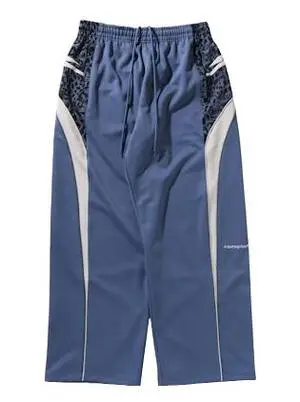 A BATHING APE Wild Leopard Pattern Oversized Fit Track Pants - Navy Blue