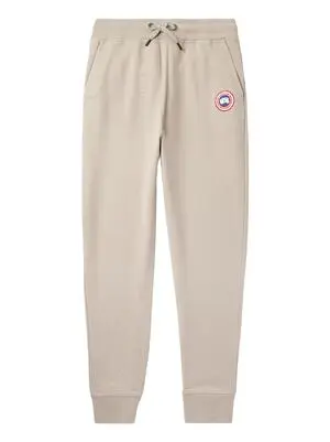 Canada Goose Huron Tapered Logo-appliquéd Cotton-jersey Sweatpants - Neutrals