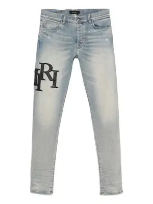 Amiri Staggered Logo Skinny Jean - Antique Indigo Black