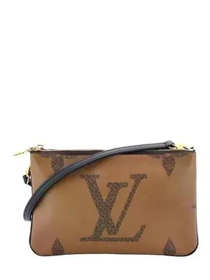 LOUIS VUITTON Double Zip Pochette Reverse Monogram Giant - Brown