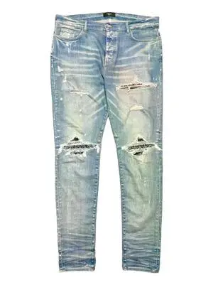 Amiri Distressed Jeans With Bandana Patch - Blue