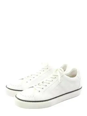 LOUIS VUITTON Monogram Debossed Sneakers - White