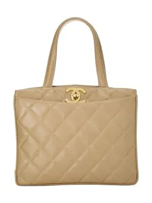 Chanel Quilted Caviar Handbag With 'cc' Turnlock - Beige