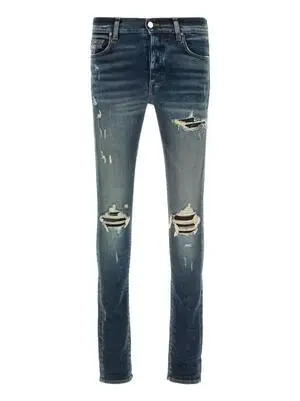 Amiri Distressed Stretch Denim Jeans - Blue