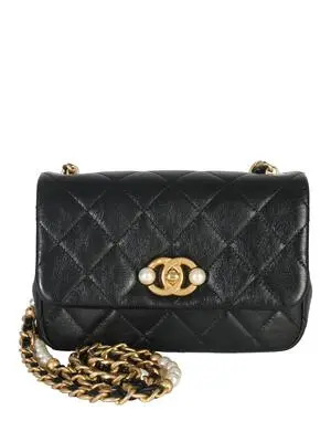 CHANEL Quilted Calfskin Mini Pearl Side Flap Bag