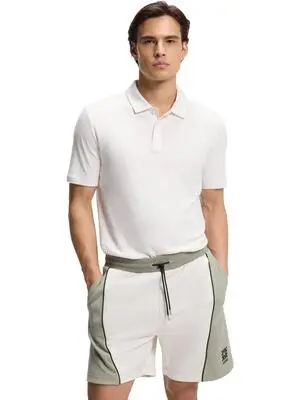 Hugo Slub-interlock Polo Shirt In A Slim Fit - White