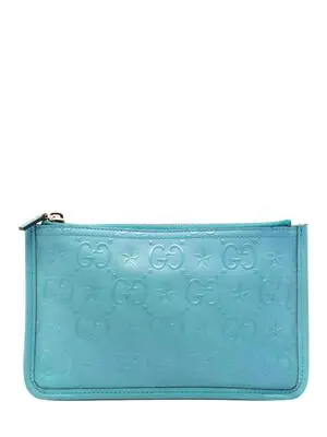 Gucci Gg Star Embossed Leather Pouch With Chain - Blue
