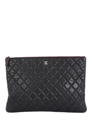 CHANEL O Case Clutch Quilted Caviar Large