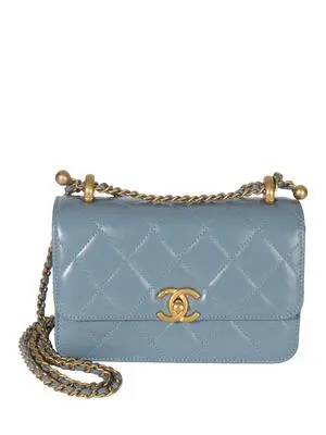 CHANEL Quilted Calfskin Mini Flap Bag