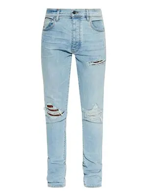 Amiri Slit Knee Jeans In Blue - 30% Off | Editorialist