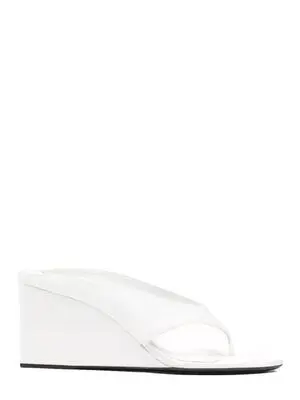 ALAÏA Satin-Finish Wedge Mules