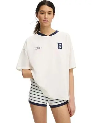 Cotton:on 90's Oversized Sporty V-neck Tee - Coconut Milk Body Wellness