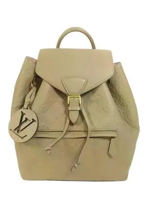 LOUIS VUITTON Montsouris Backpack In Beige Monogram Empreinte Leather - Neutrals