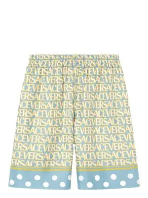 Versace All-over Logo Printed Knee-length Shorts - Nude