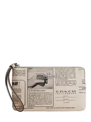 COACH OUTLET Large Corner Zip Wristlet With Newspaper Print - Silver/chalk Multi
