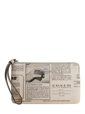 COACH OUTLET Large Corner Zip Wristlet With Newspaper Print Silver/chalk Multi