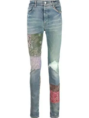 Amiri Distressed Patchwork Skinny Jeans - Blue